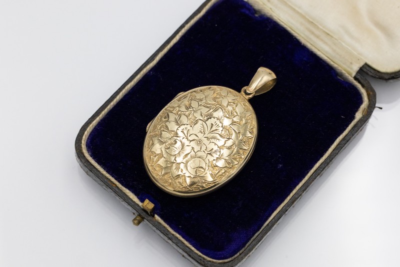Old double-sided engraved locket, circa 1900.